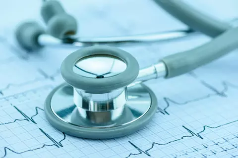 Stethoscope on cardiogram